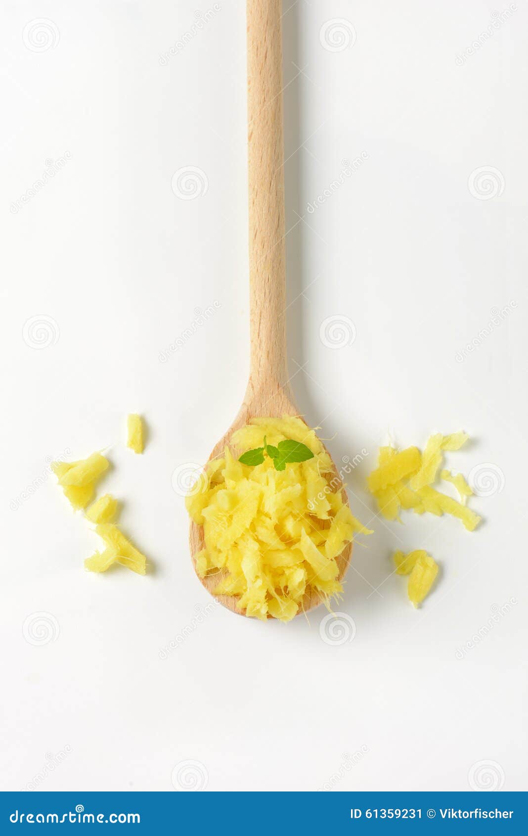 Grated ginger on spoon stock image. Image of condiment - 61359231