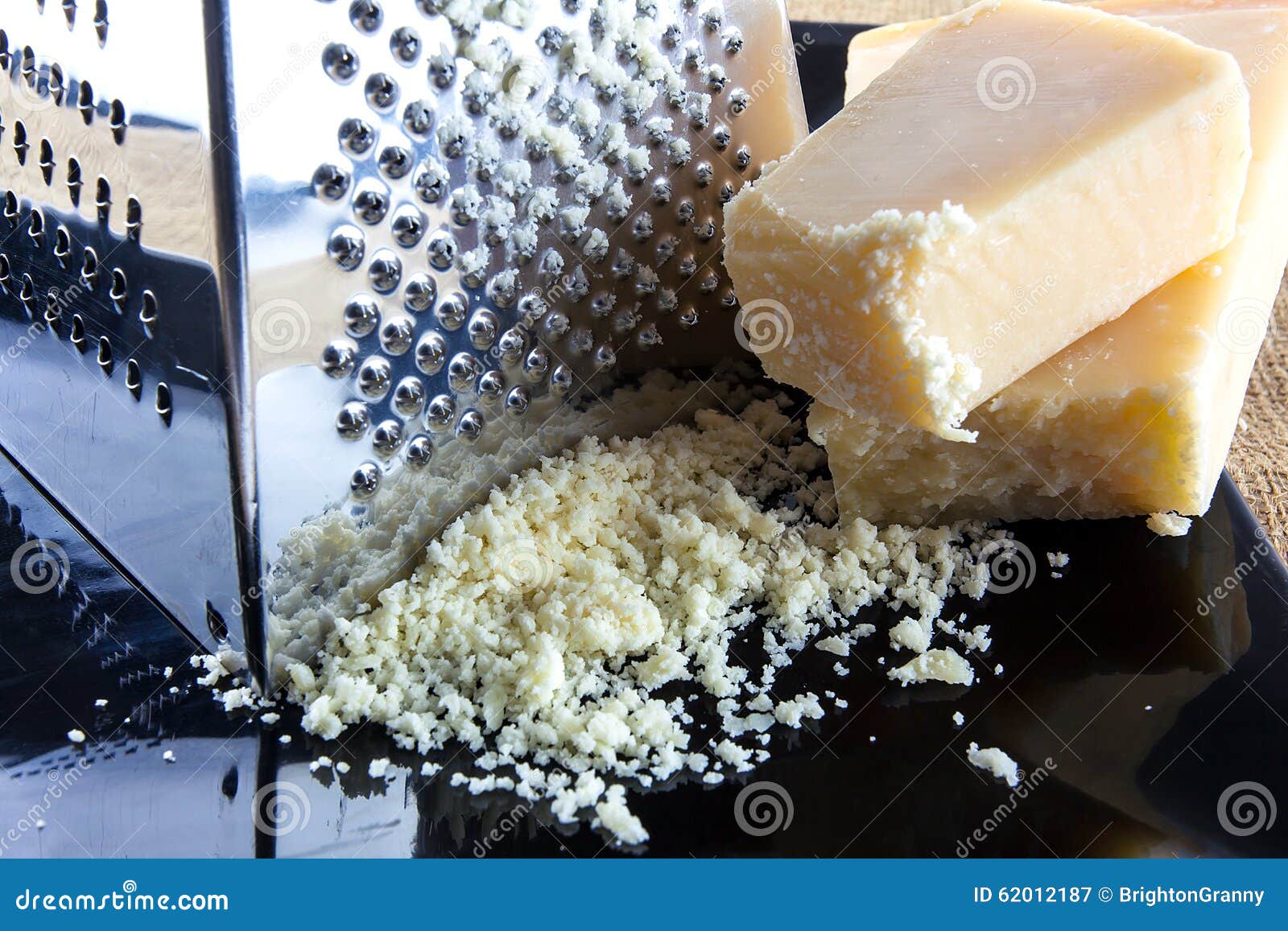 Grated Italian cheese stock image. Image of wedge, grated - 62012187