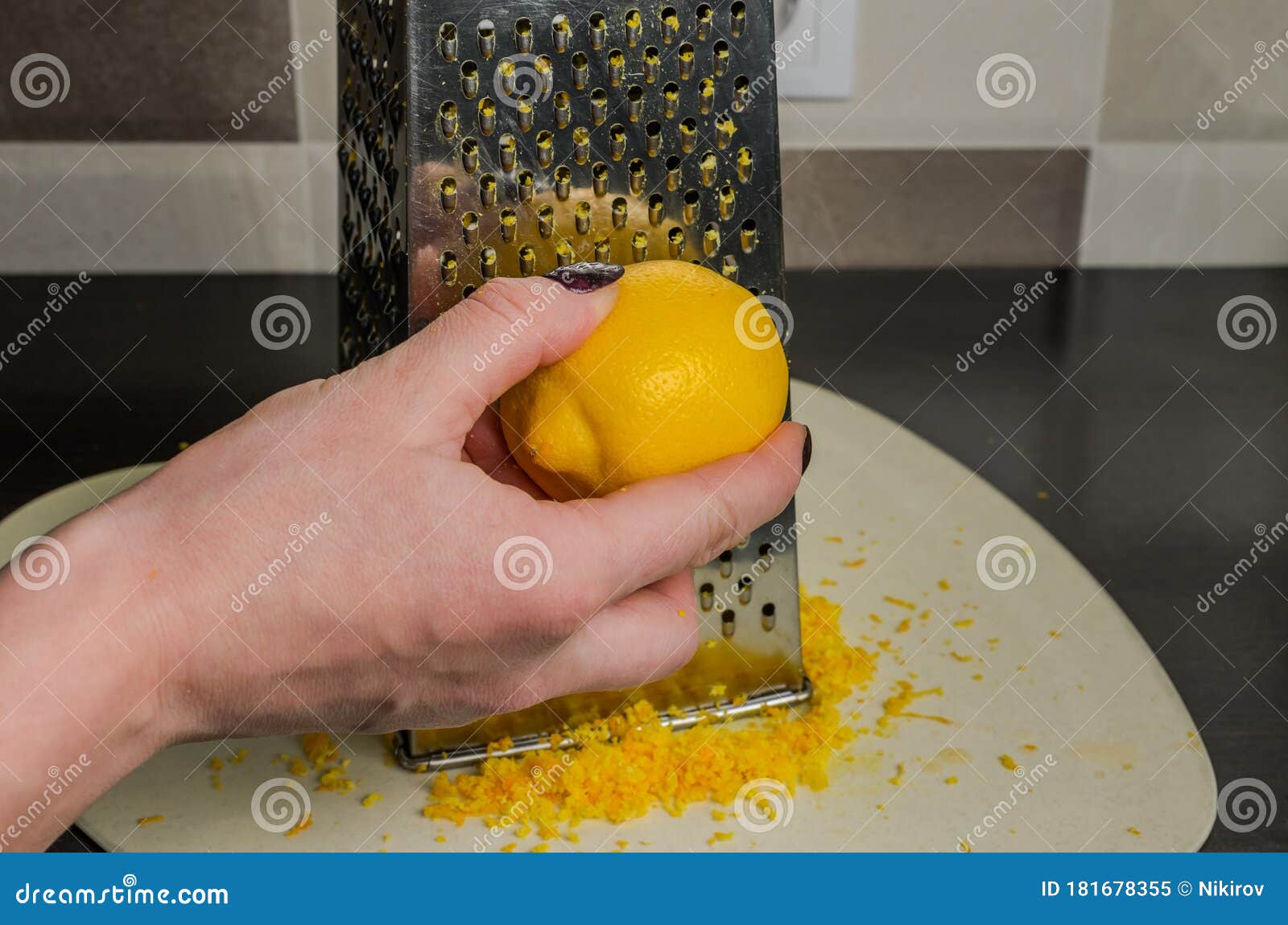 Grated Lemon Zest on a Metal Grater Stock Image - Image of baking, cook ...