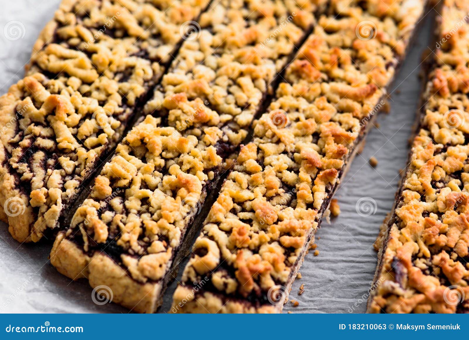 Grated Pie with Jam on Parchment Paper Top View, Cut Along Stock Image ...