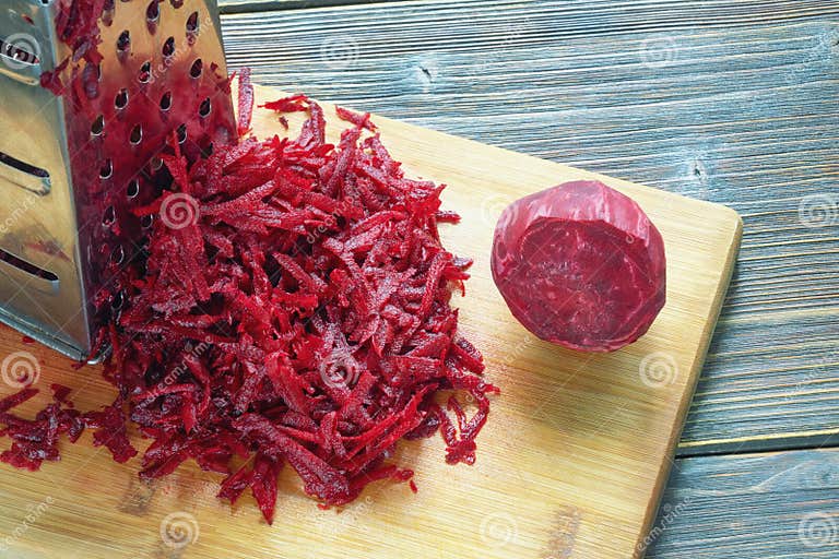 Grated Red Beetroot and Grater on Cutting Board Stock Photo - Image of ...