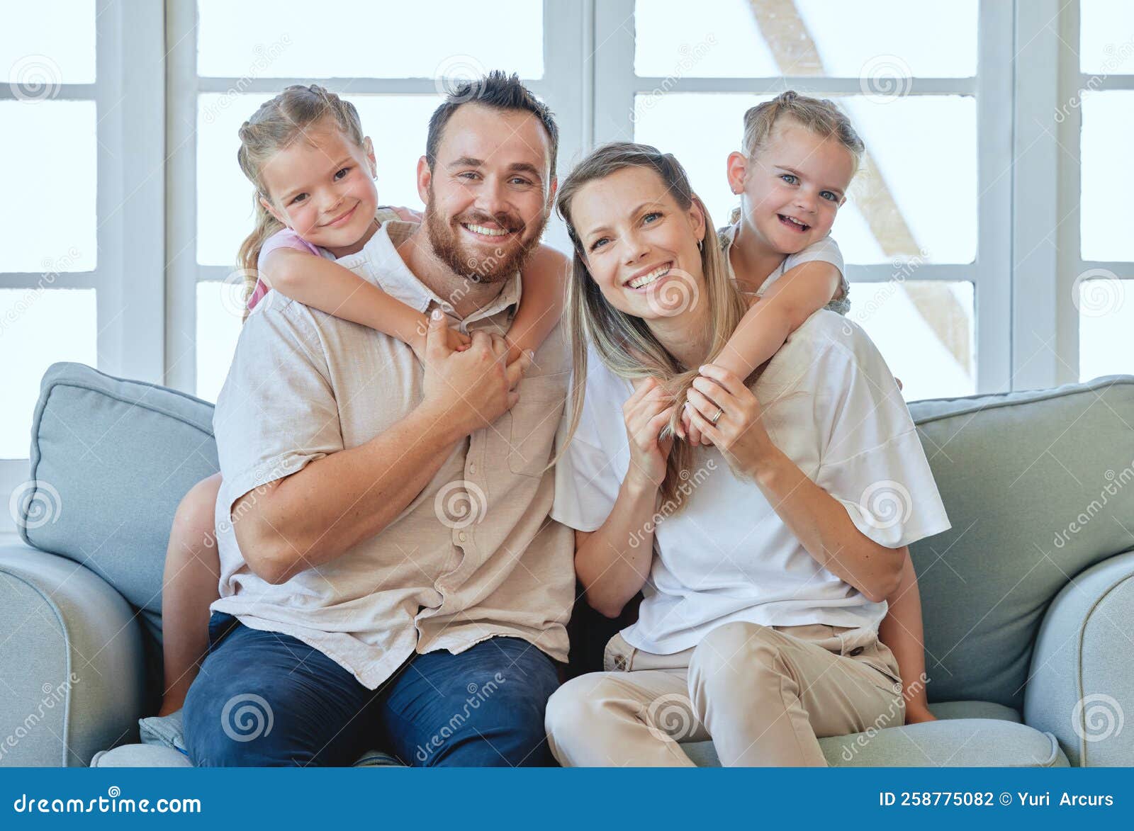 Grateful for Family. a Young Family Relaxing Together at Home. Stock ...