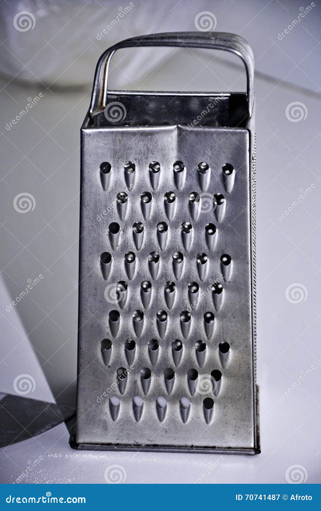 Grater stock image. Image of closeup, cutting, grind - 70741487