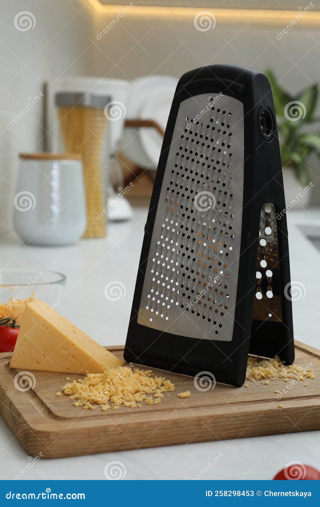 Grater and Delicious Cheese on Kitchen Counter Stock Image - Image of ...