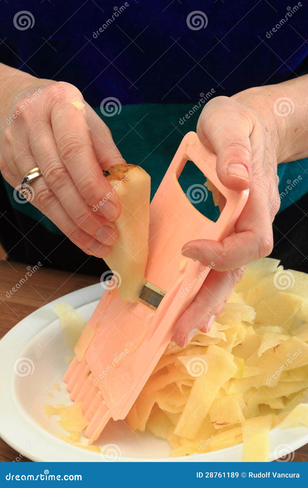 Grating an Apple stock image. Image of food, hands, hand - 28761189