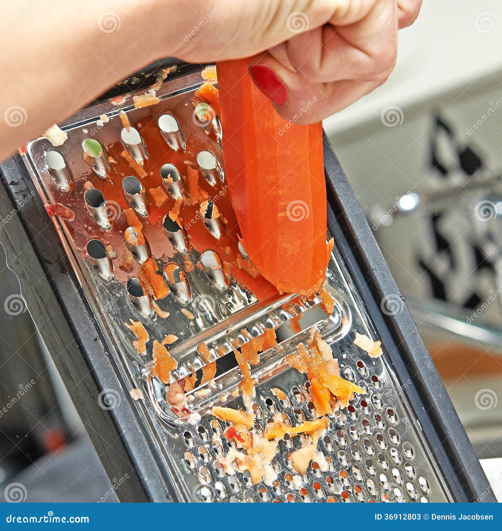 Grating a carrot stock image. Image of vegetables, nutrition - 36912803