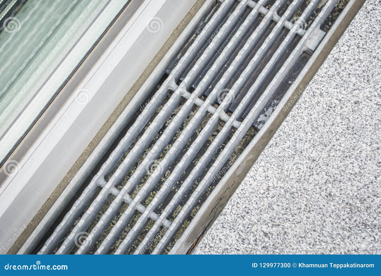 A grating drain gutter stock photo. Image of design - 129977300