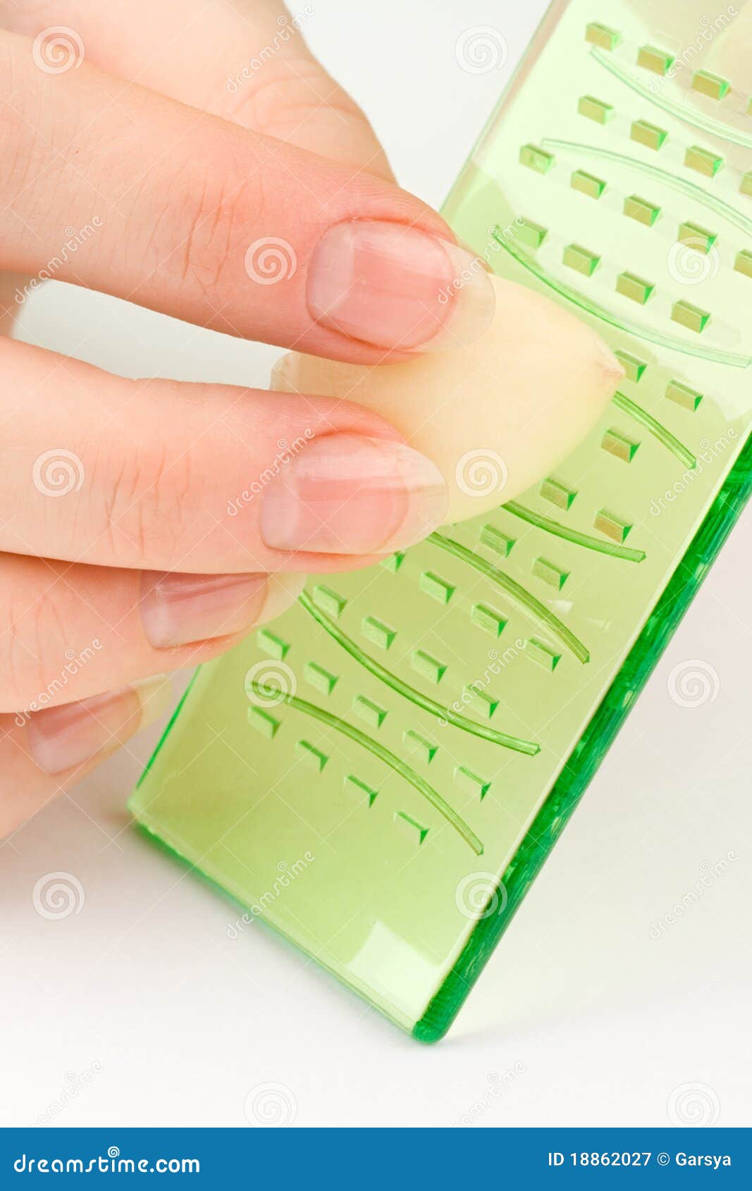 Grating garlic stock image. Image of meal, cutting, grater - 18862027