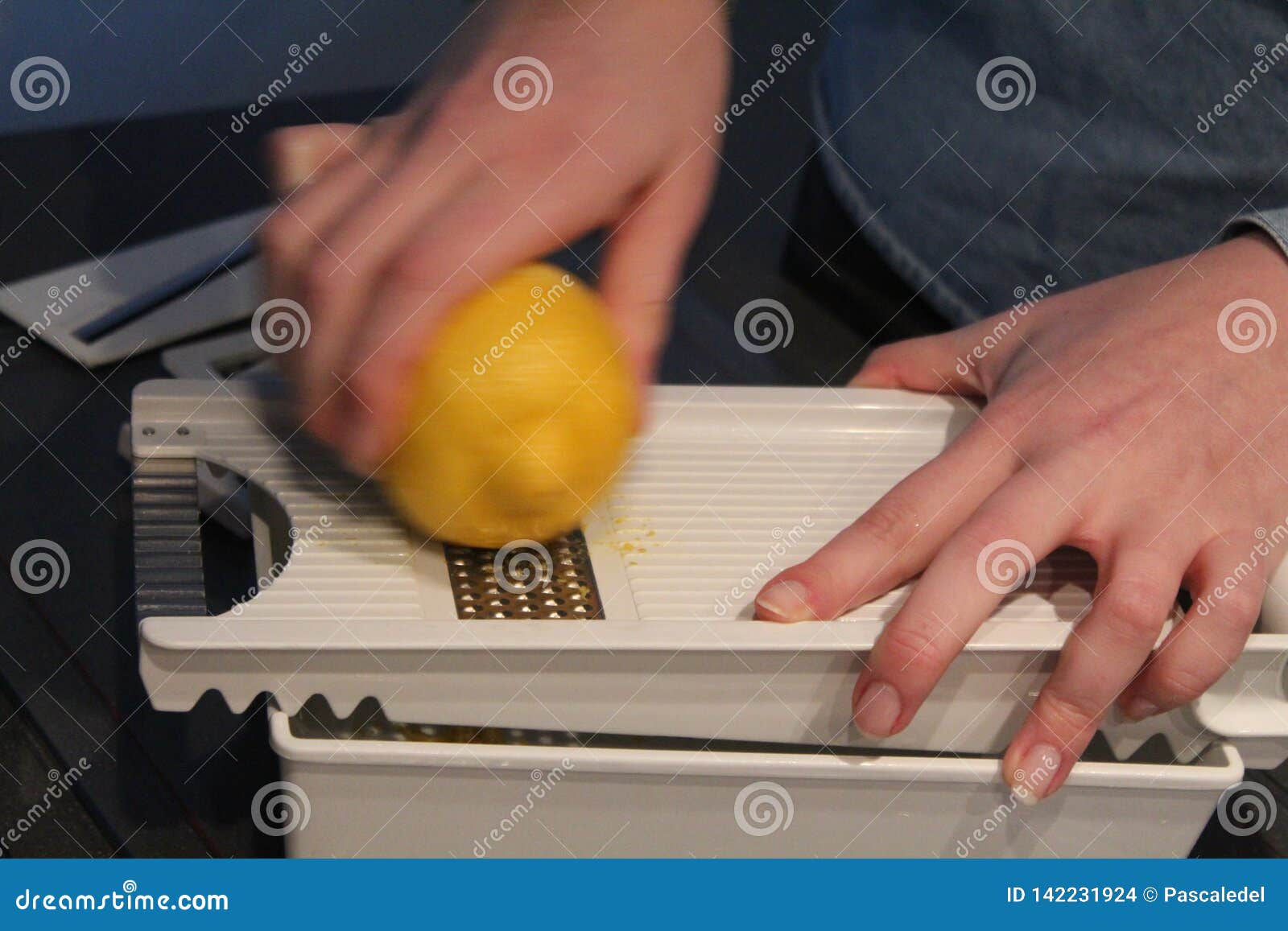 Grating a Lemon stock photo. Image of businesswoman - 142231924