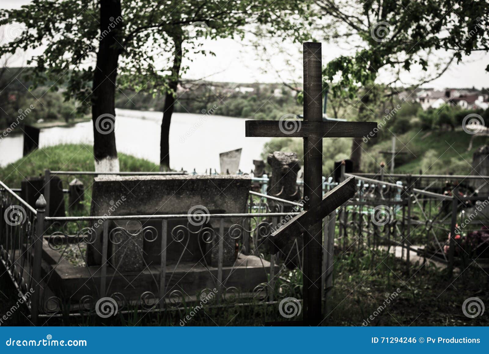 Grave is Near the River with a Cross Stock Photo - Image of monument ...