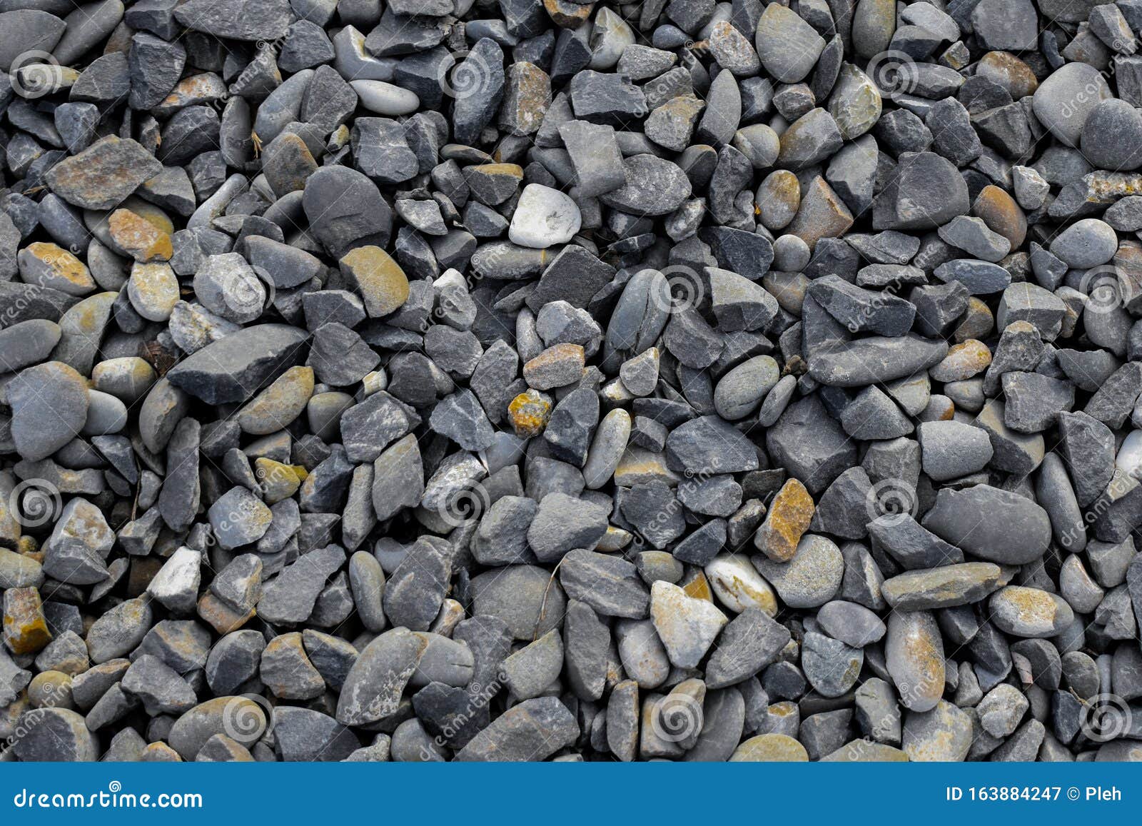 Gravel Background with Small and Medium Size Gray and Dark Yellow ...