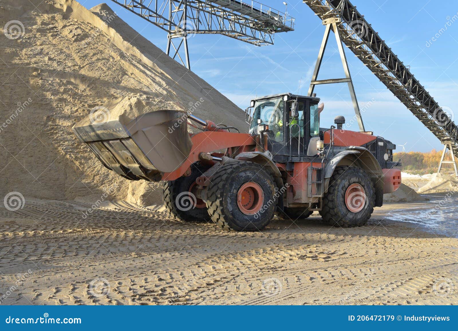 Gravel Pit: Building and Wheel Loader Loading Gravel Onto a Truck Stock ...
