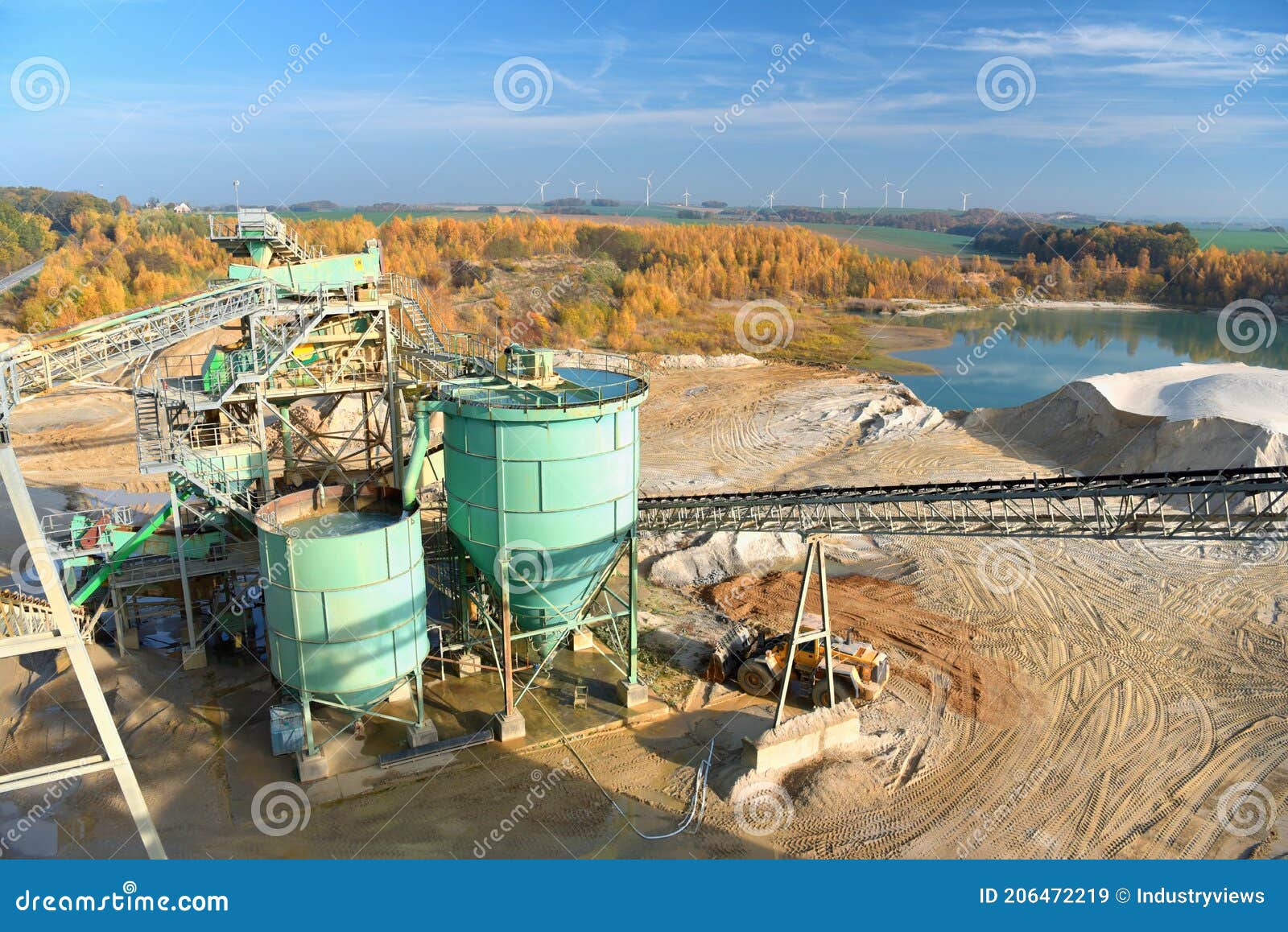 Gravel Pit: Building and Wheel Loader Loading Gravel Onto a Truck Stock ...