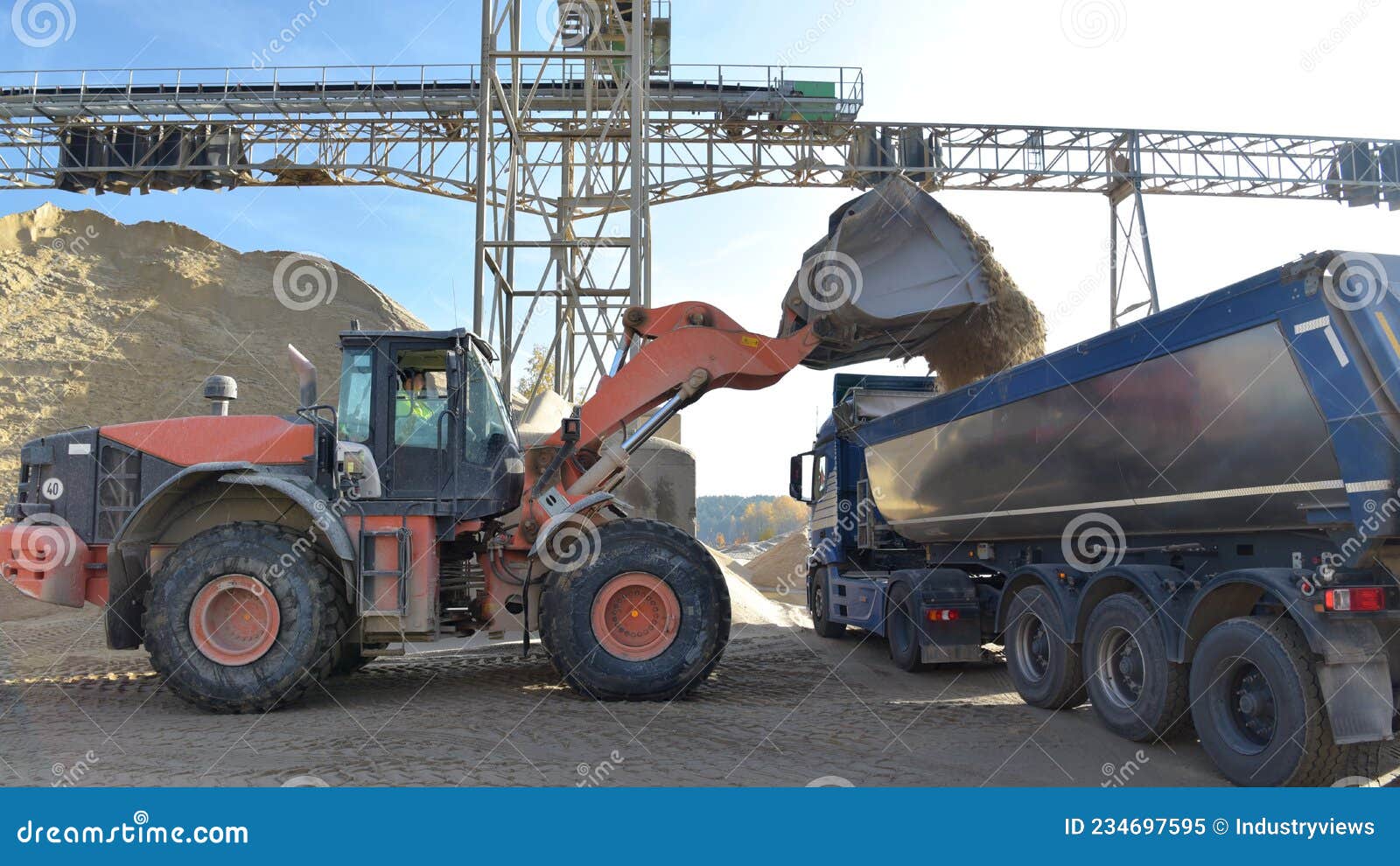 Gravel Pit: Building and Wheel Loader Loading Gravel Onto a Truck Stock ...