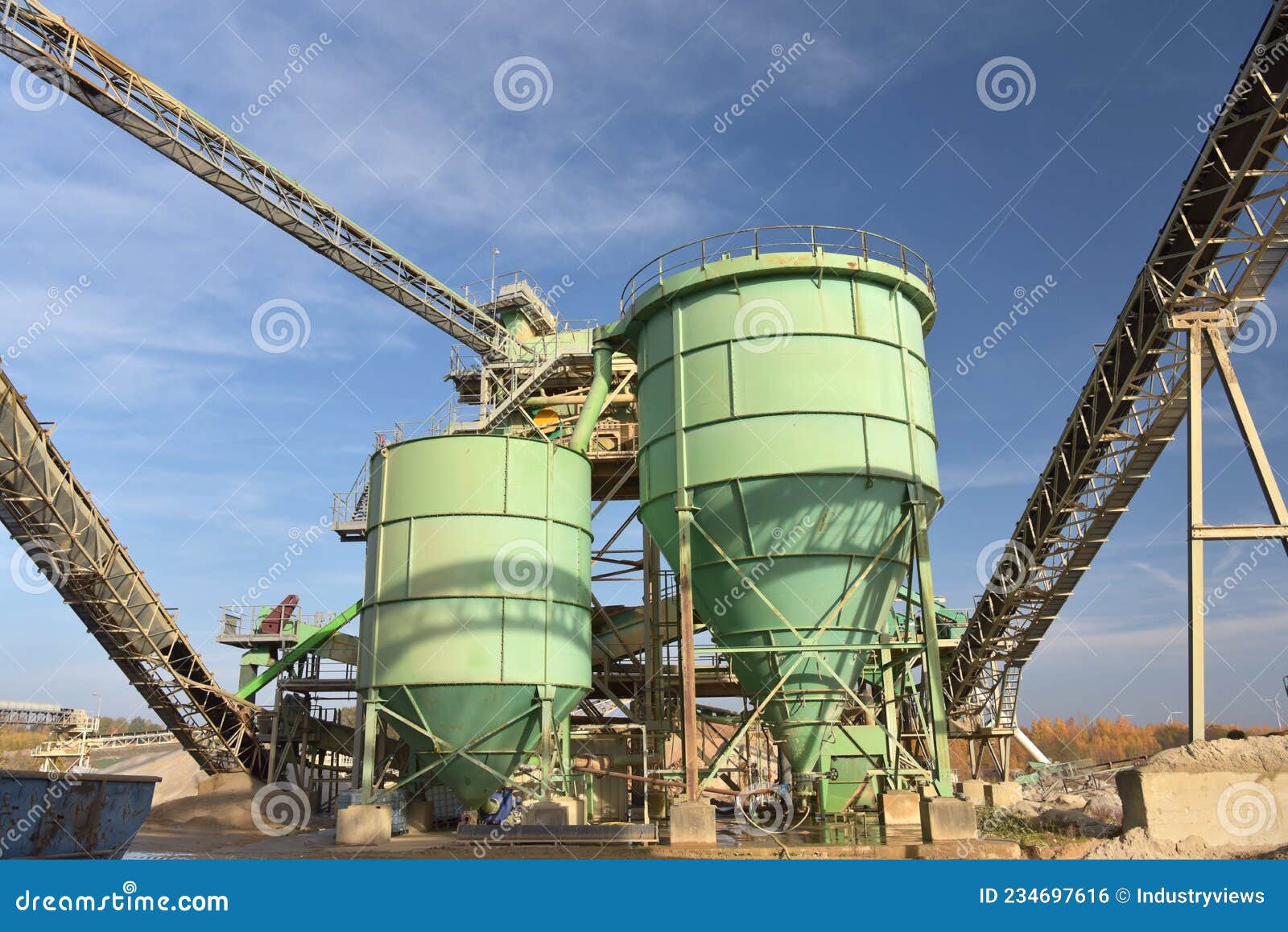 Gravel Pit: Building and Wheel Loader Loading Gravel Onto a Truck Stock ...