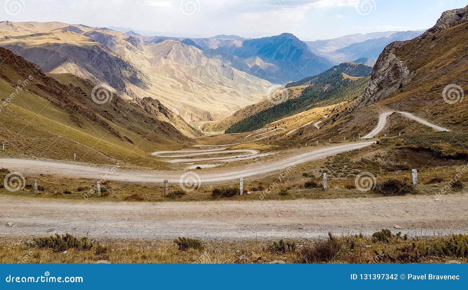 A Gravel Road with Many Turns through Pass Stock Photo - Image of ...
