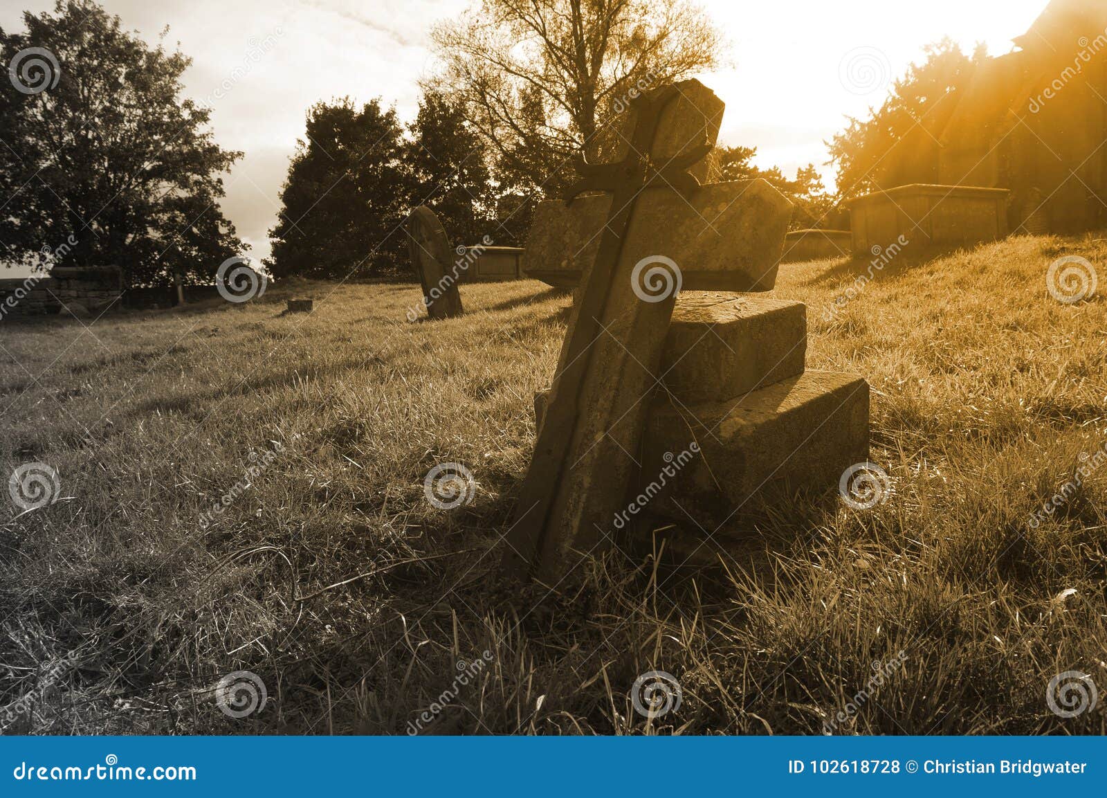 Gravestone Cross at Sunset with Selective Colour Stock Photo - Image of ...