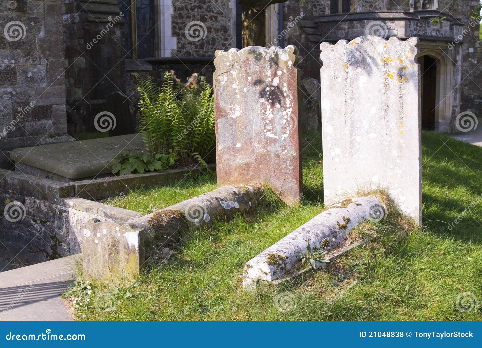 Gravestones in a Sunny Country Cemetery Stock Photo - Image of grass ...