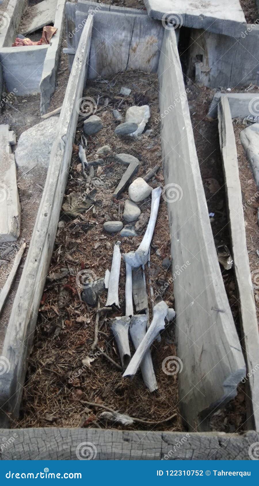 Graveyard with open graves stock photo. Image of kalash - 122310752