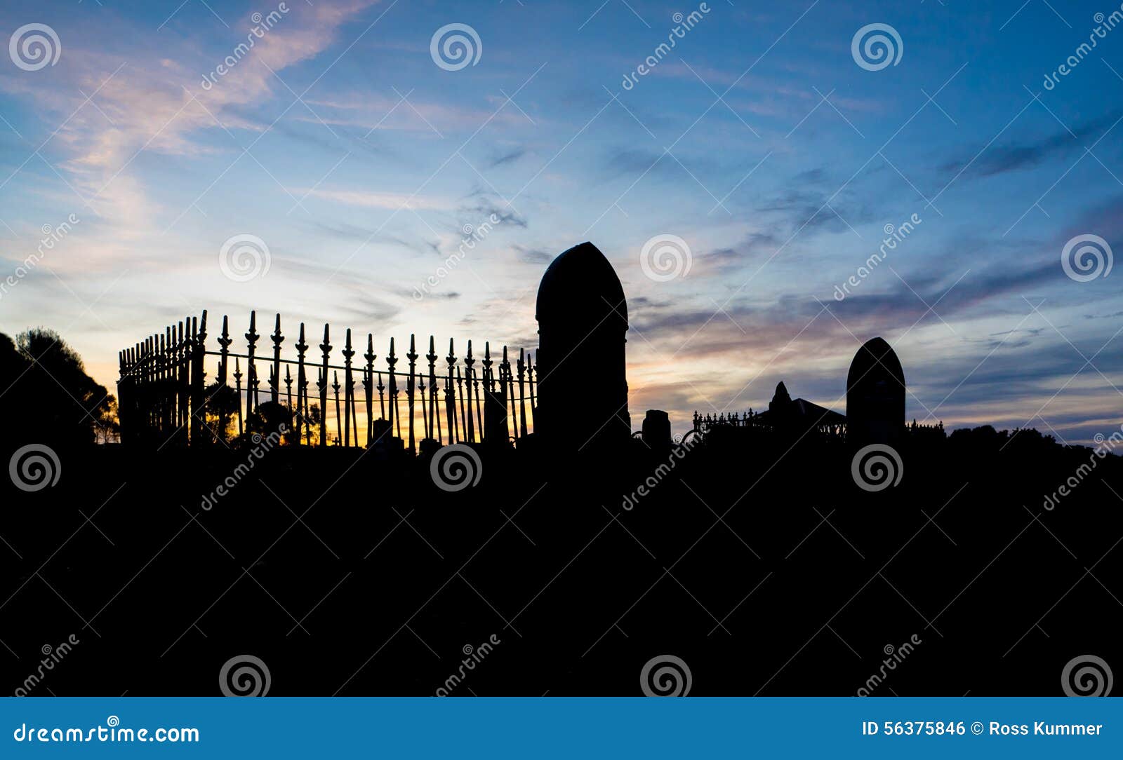 Graveyard at sunset stock photo. Image of christ, graveyard - 56375846