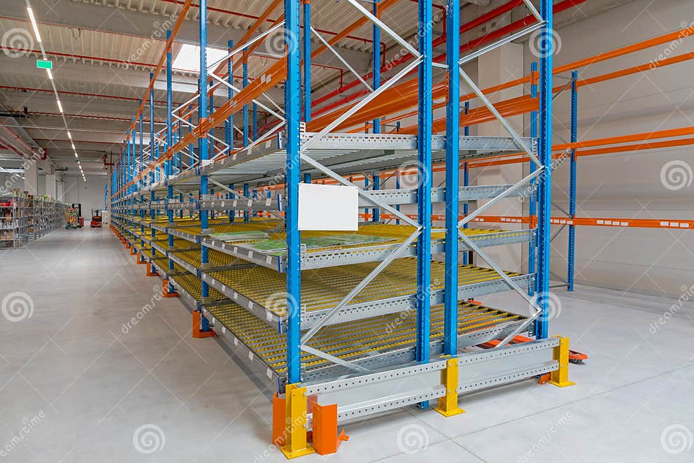 Gravity Flow Shelving stock photo. Image of glides, storage - 196975400