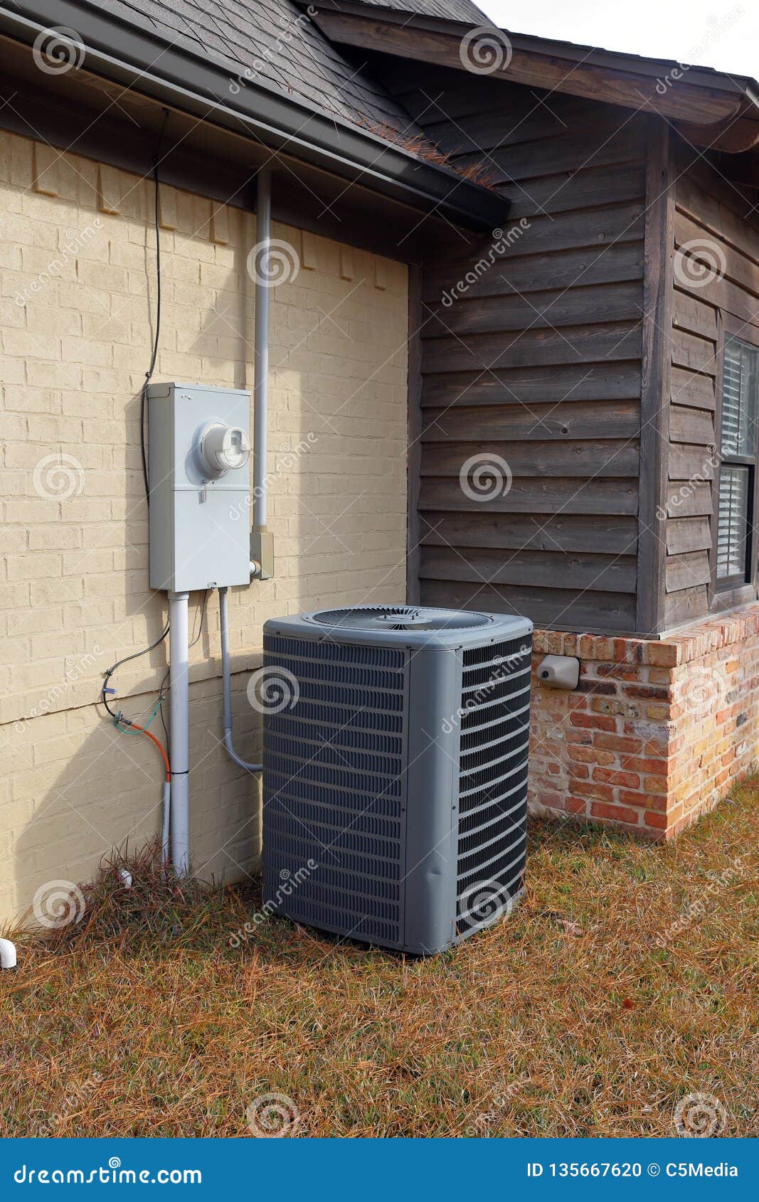 Gray Air Conditioner Condensor Unit Next To Home Stock Photo - Image of ...