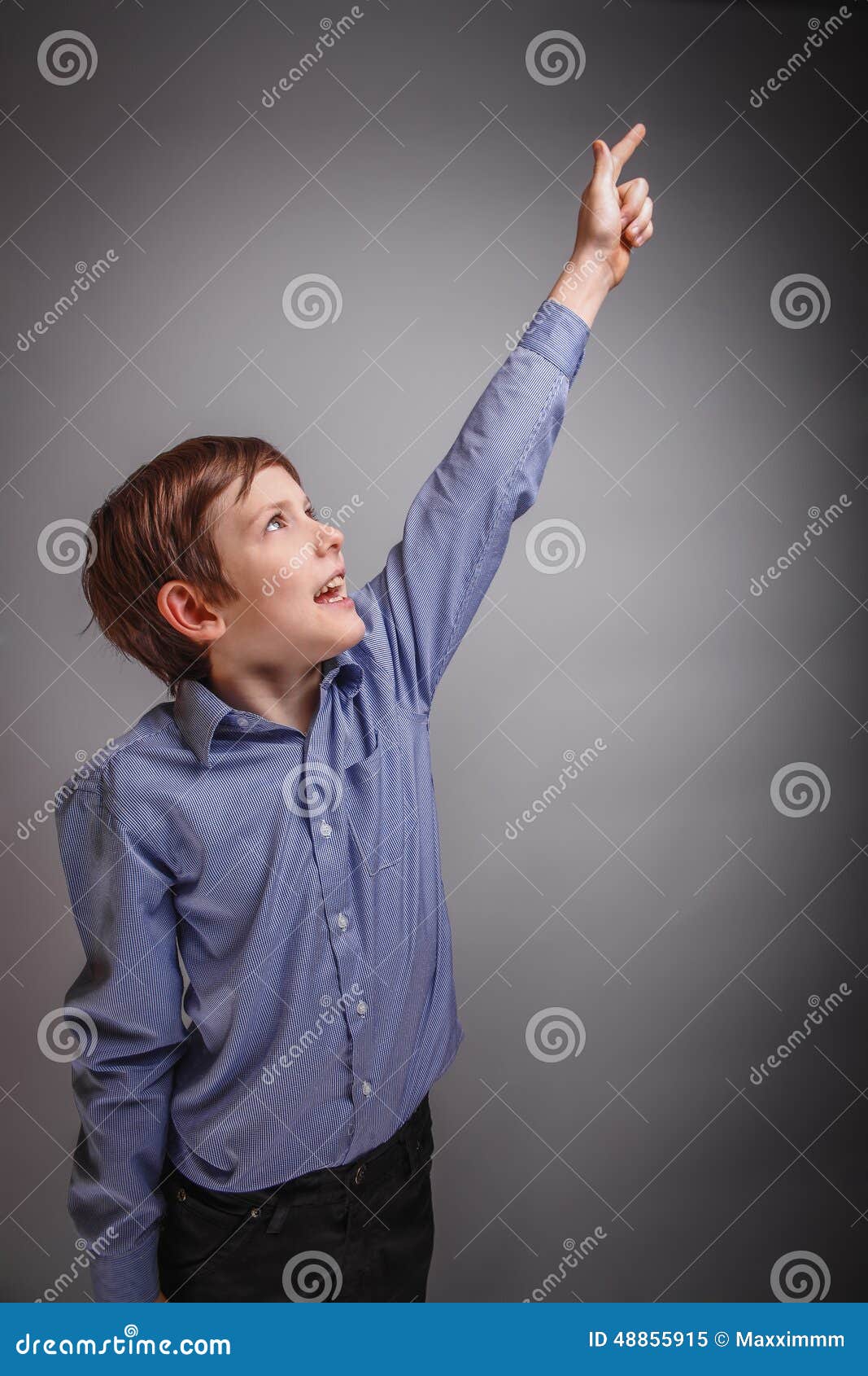 On Gray Background Boy Raised His Hand Up Stock Image - Image of look ...