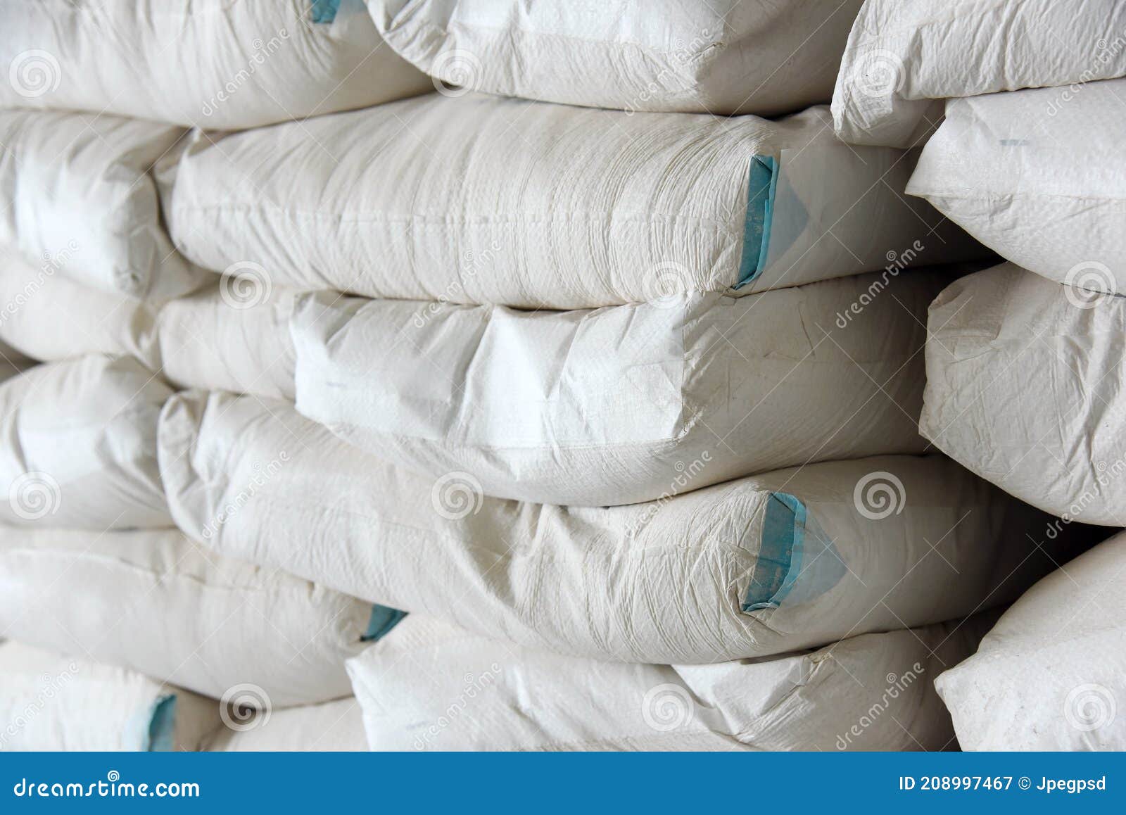 Gray Bags of Grain Stacked on Pallets in the Warehouse of the ...