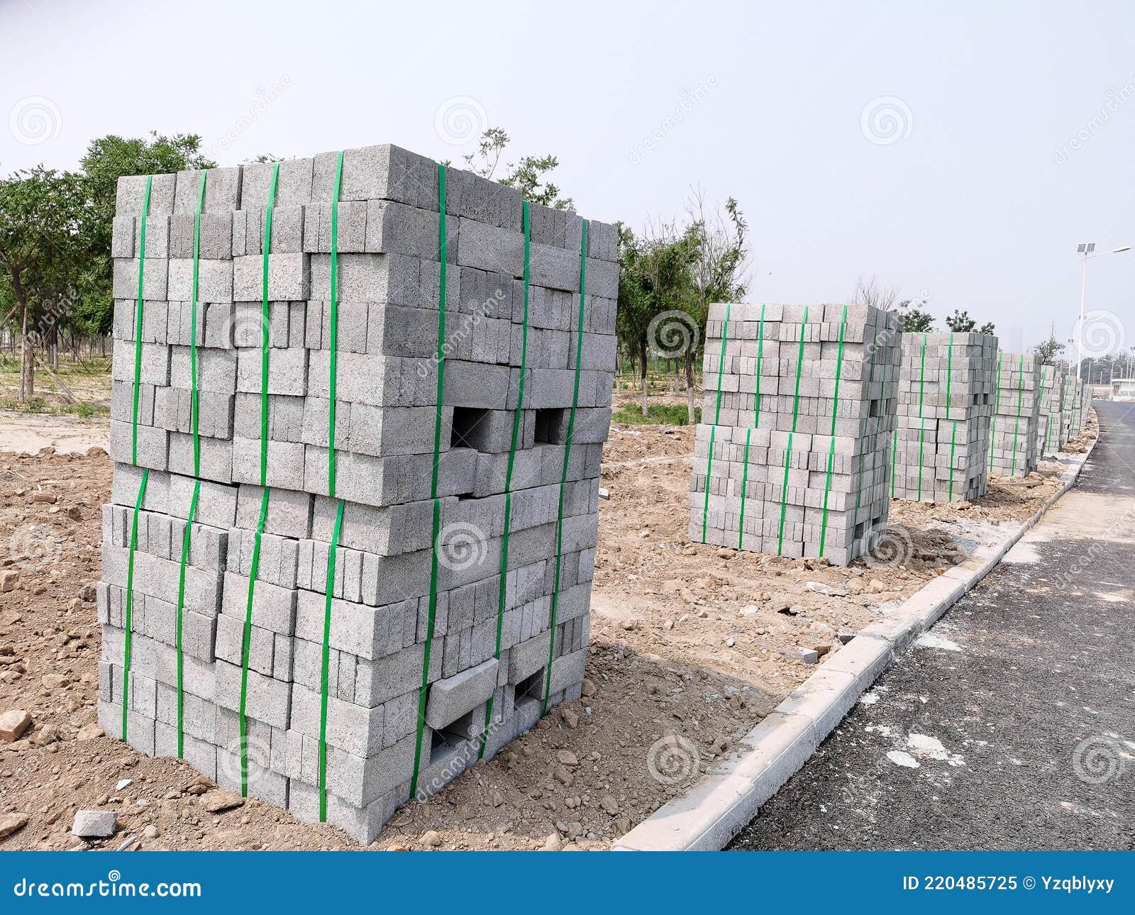 Blocks Of Paving Slabs Lie In A Construction Wheelbarrow And Are ...