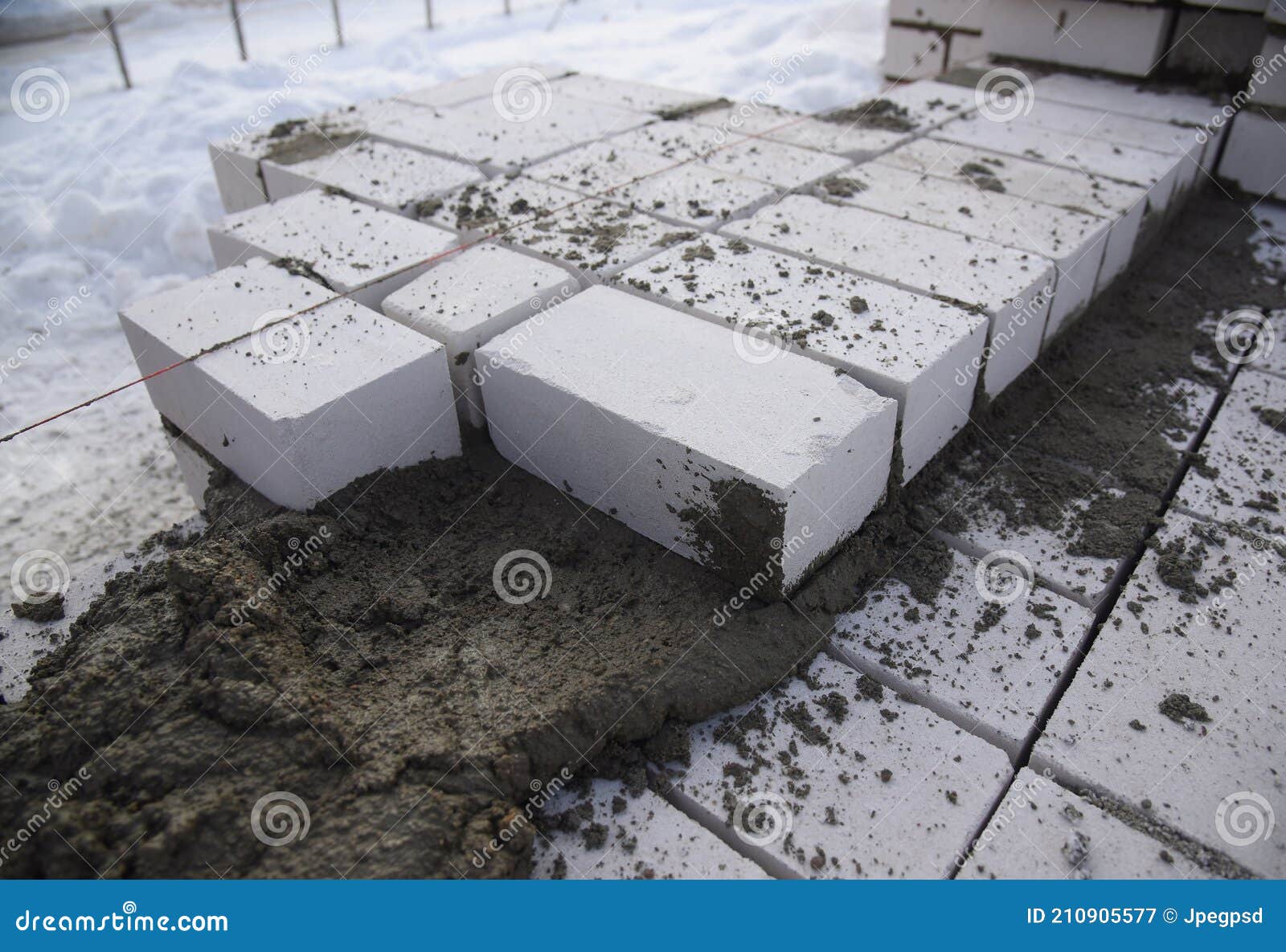 Gray Bricks are Laid in Straight Rows in the Cement . Stock Image ...