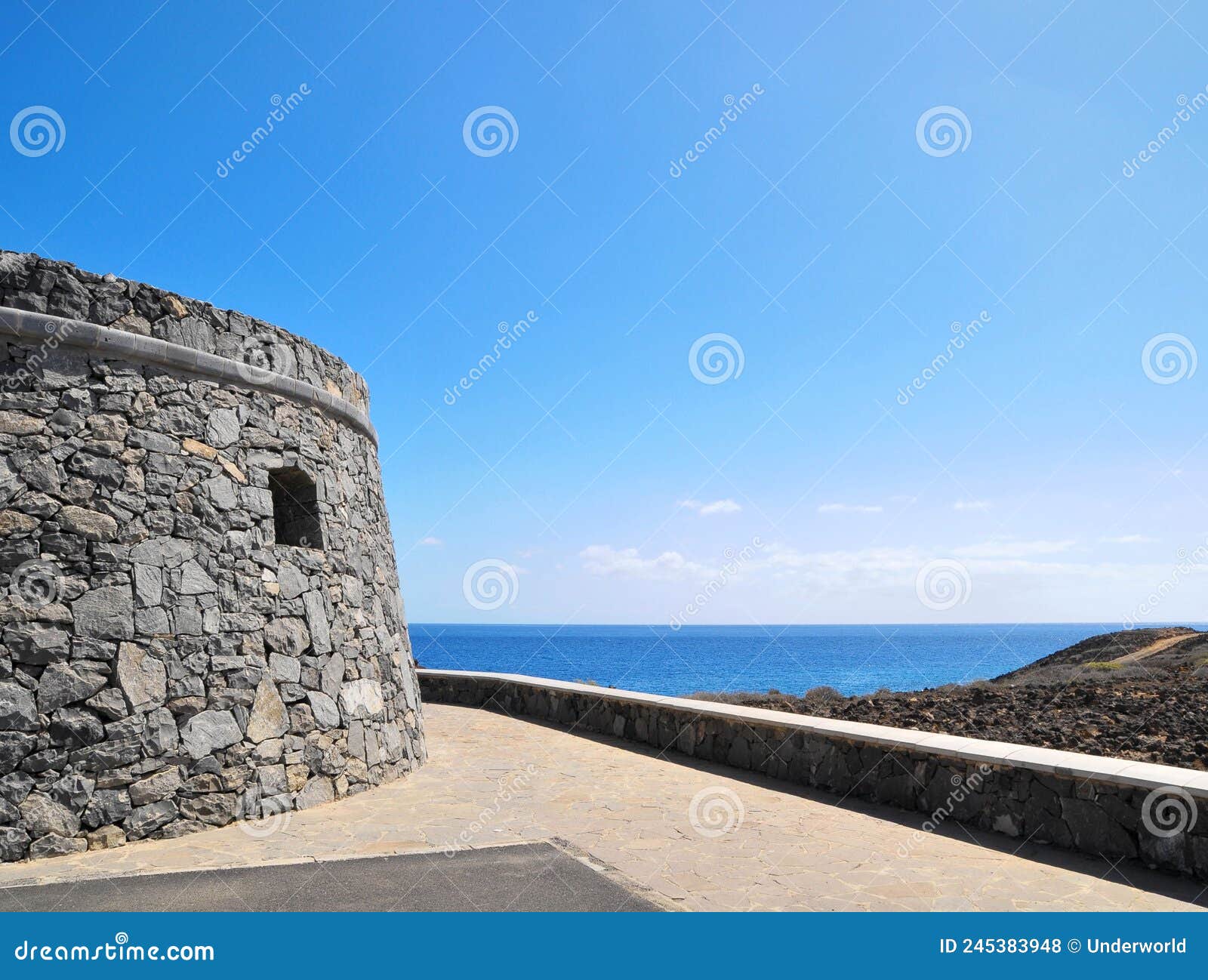 Gray Bunker on a Blue Sky stock photo. Image of fortification - 245383948