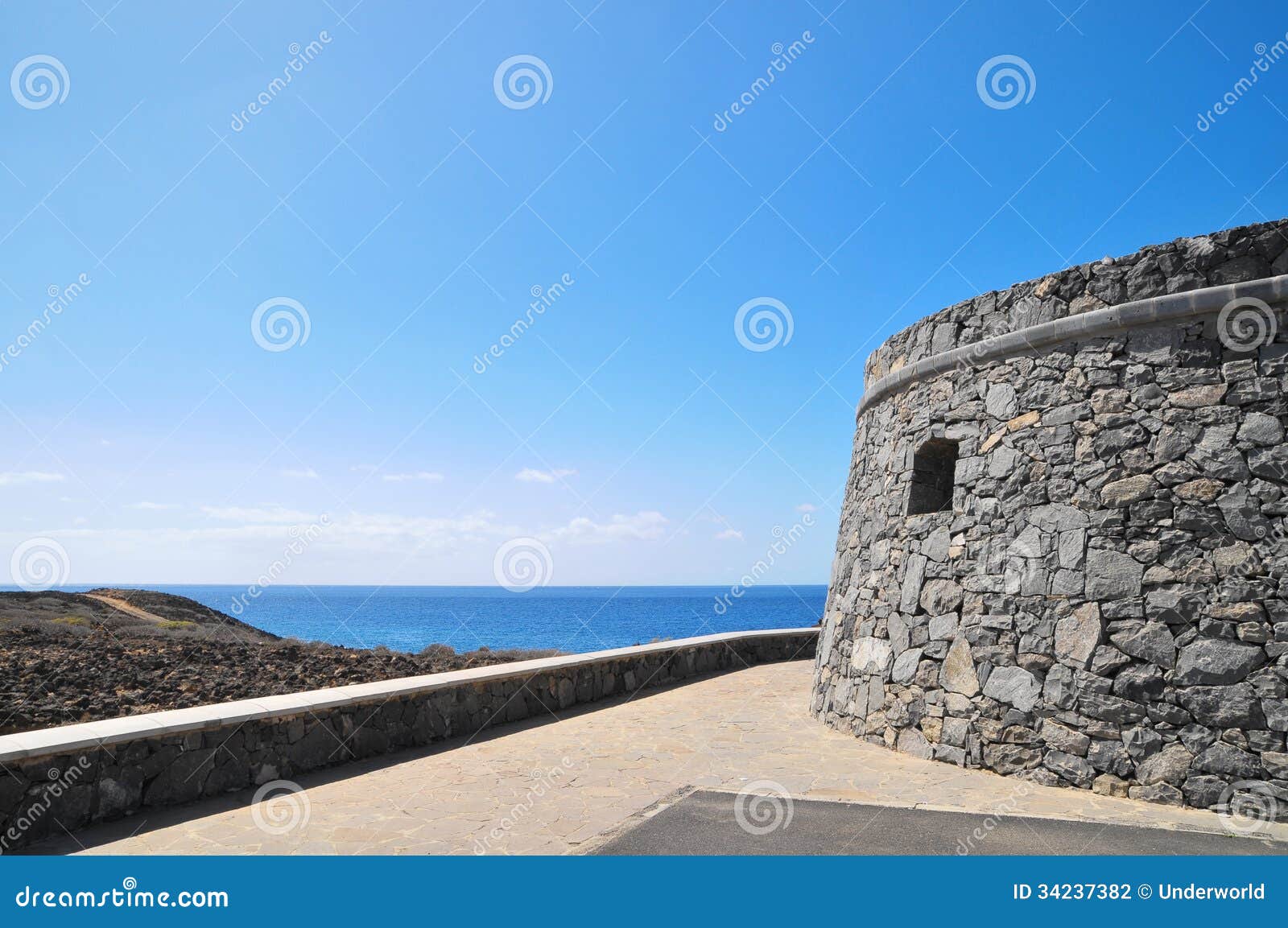 Gray Bunker on a Blue Sky stock photo. Image of construction - 34237382