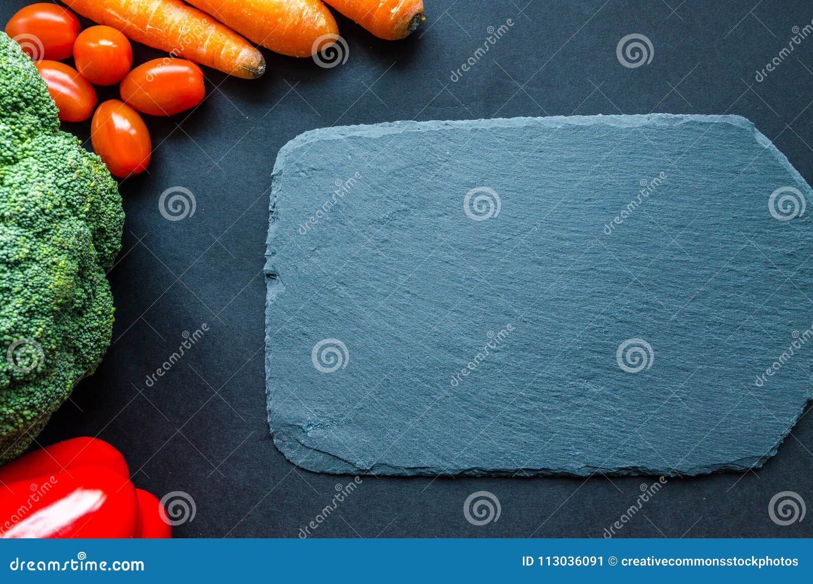 Gray Chapping Board Beside Vegetables Picture. Image: 113036091