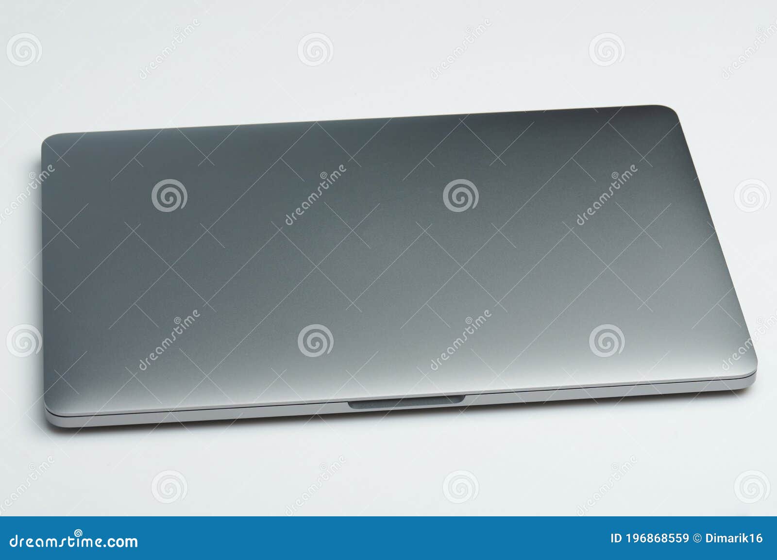 Gray closed metal laptop stock image. Image of white - 196868559