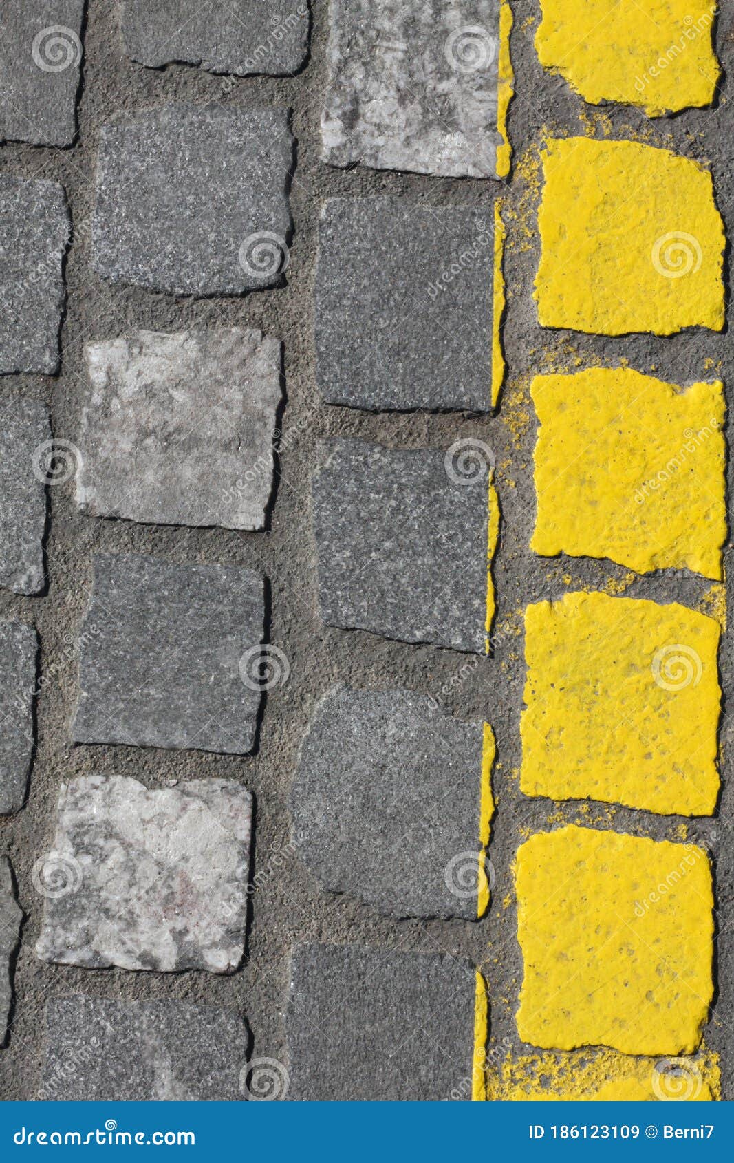 Gray Cobblestone Background with Bright Yellow Line Stock Image - Image ...