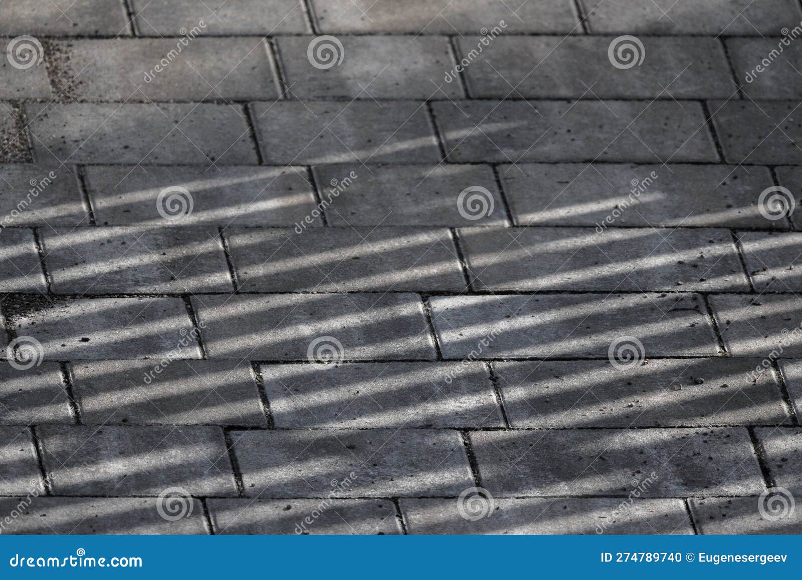 Gray Concrete Cobble Road with Striped Shadows Pattern Stock Photo ...