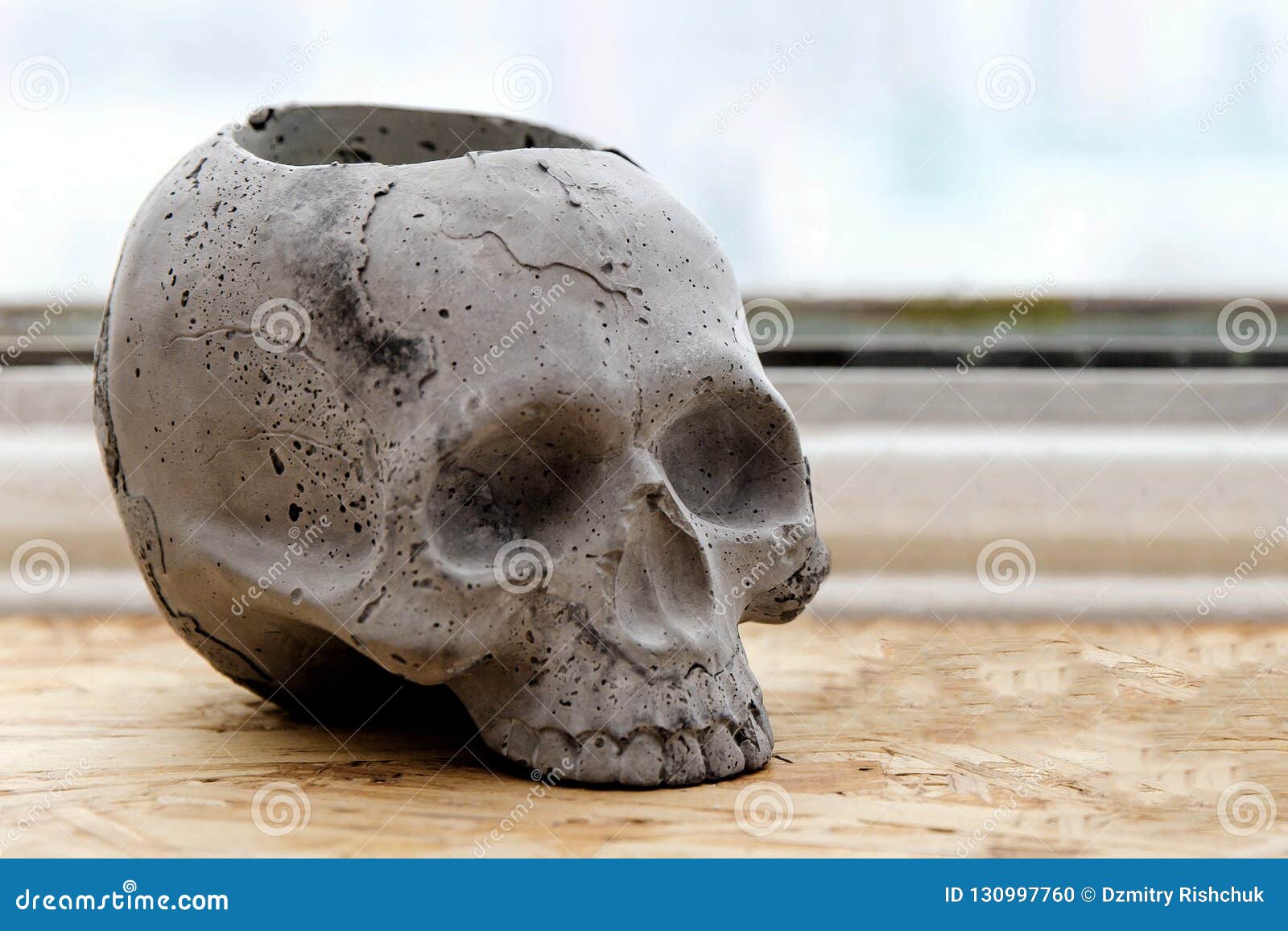 Gray Concrete Human Skulls on Background. a Skull Made of Cement for ...