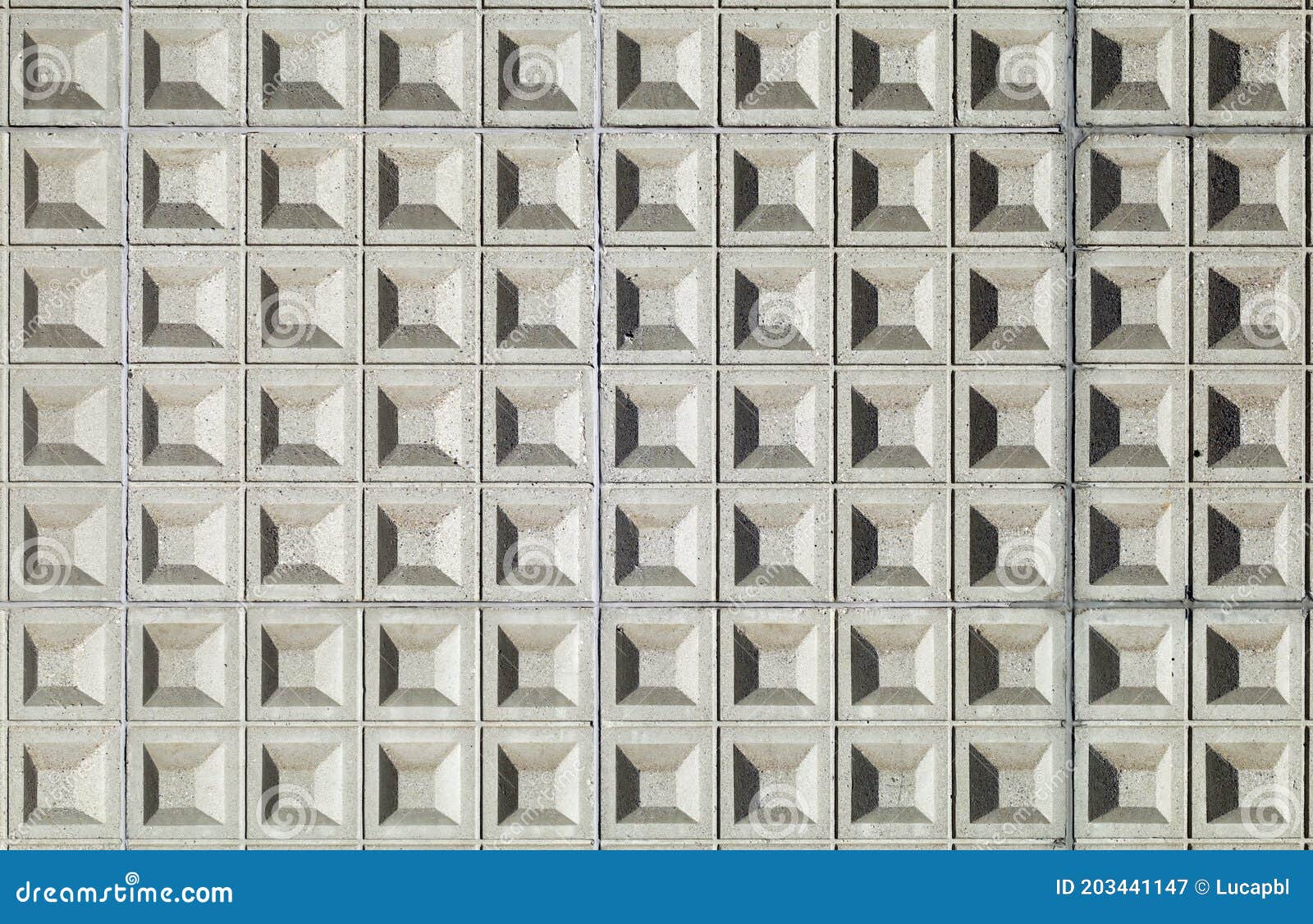 Gray Concrete Wall Decorated with a Regular Pattern of Embossed Square ...