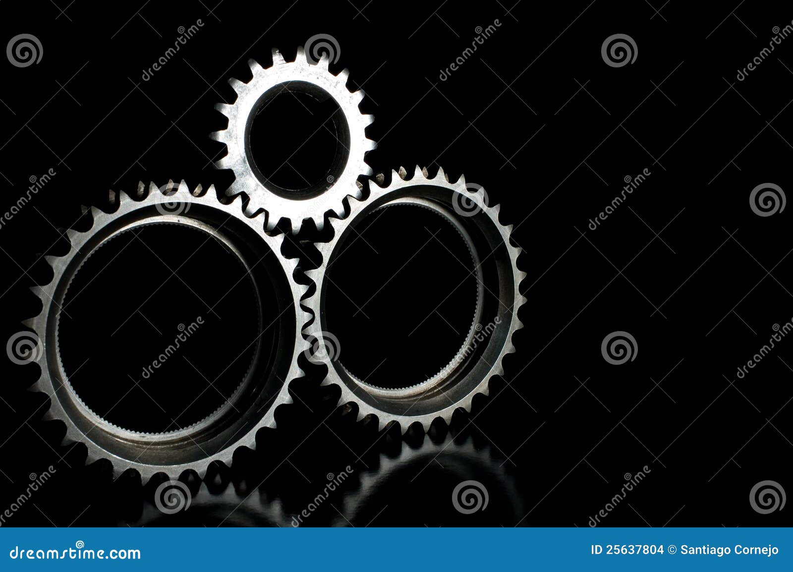 Gray Connected Gears Closeup Over Black Background Stock Photo - Image ...