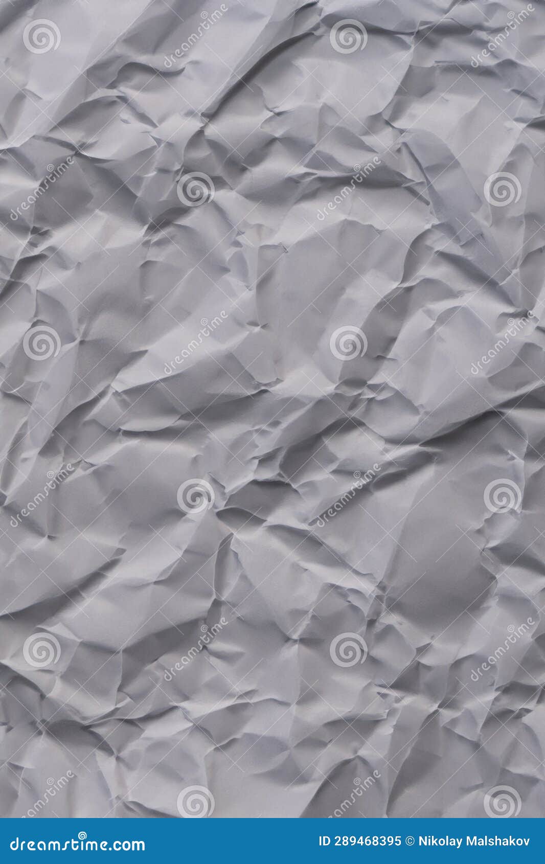 The Gray Crumpled Paper Background Offers a Tactile and Visual Texture ...