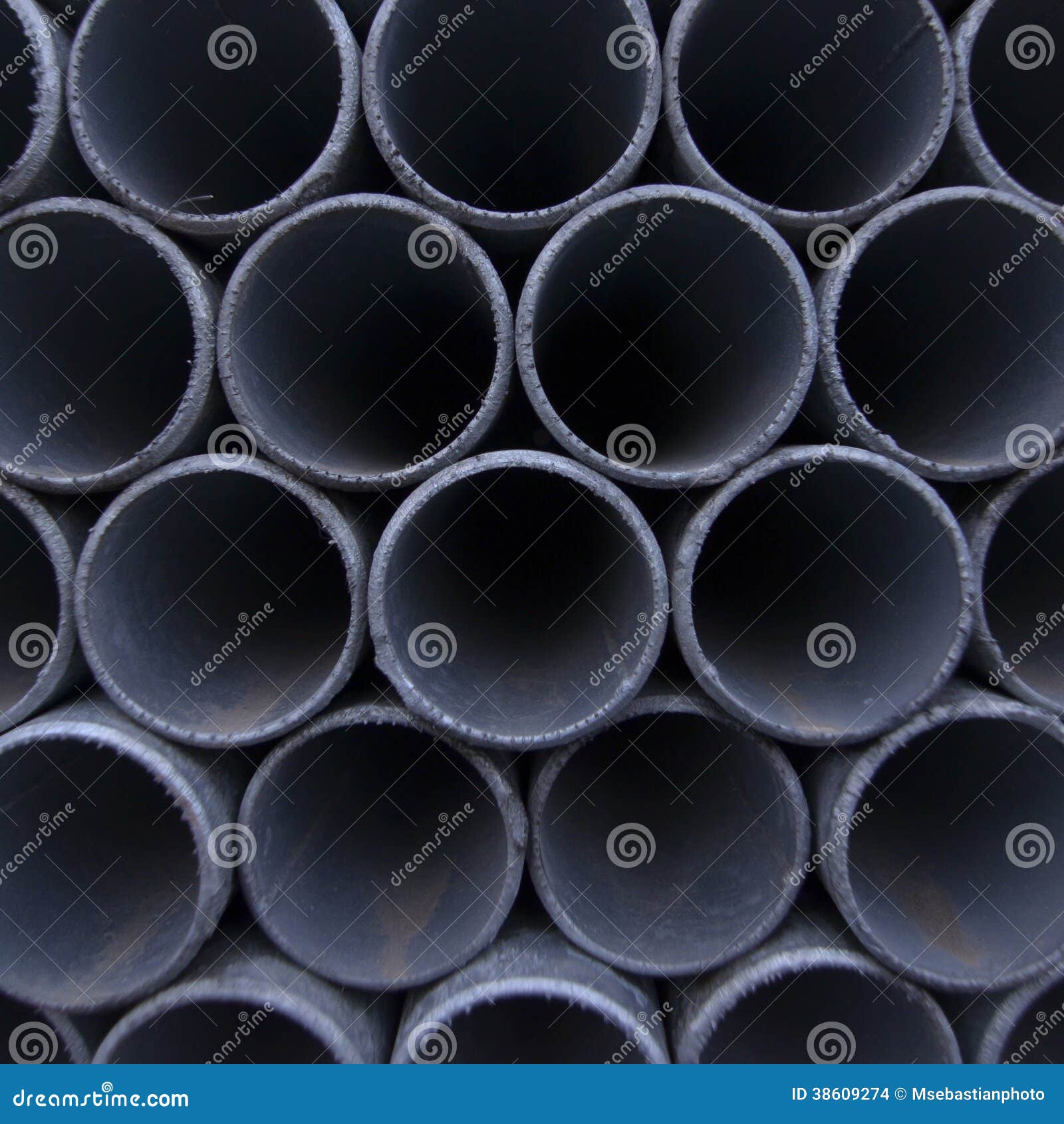 Gray Dusty Pipes Stacked in Construction Site Stock Photo - Image of ...