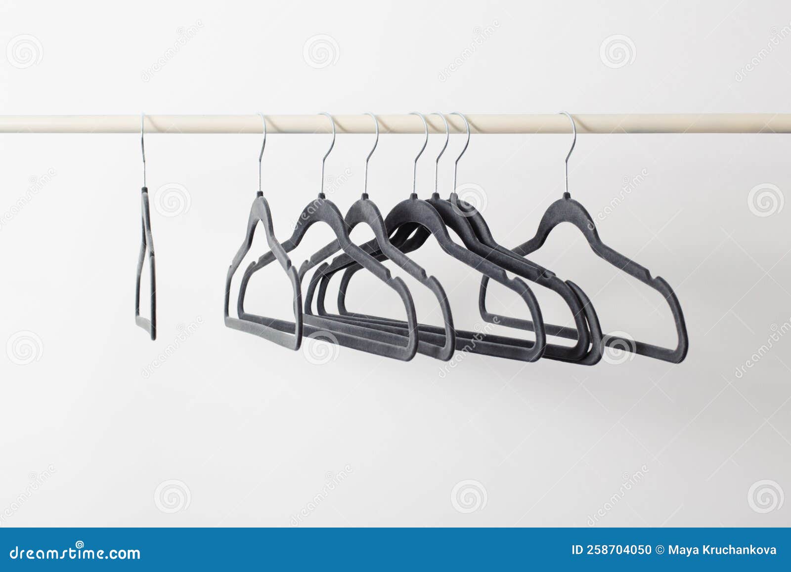Empty Hangers on Railing White Background Stock Photo - Image of black ...