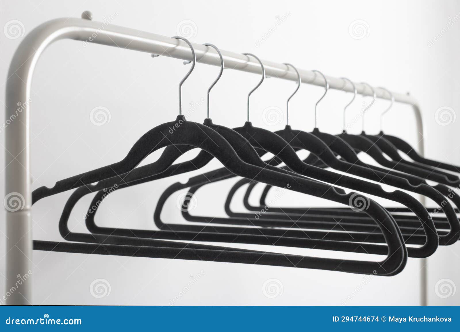 Gray Empty Hangers on Railing White Background Stock Photo - Image of ...