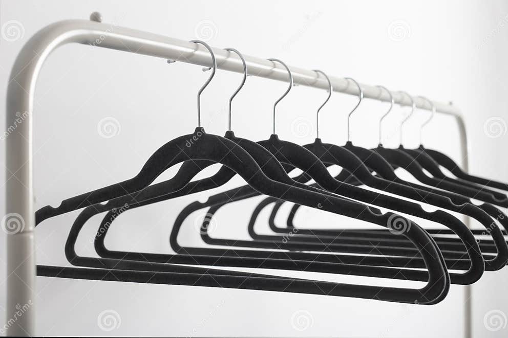 Gray Empty Hangers on Railing White Background Stock Photo - Image of ...