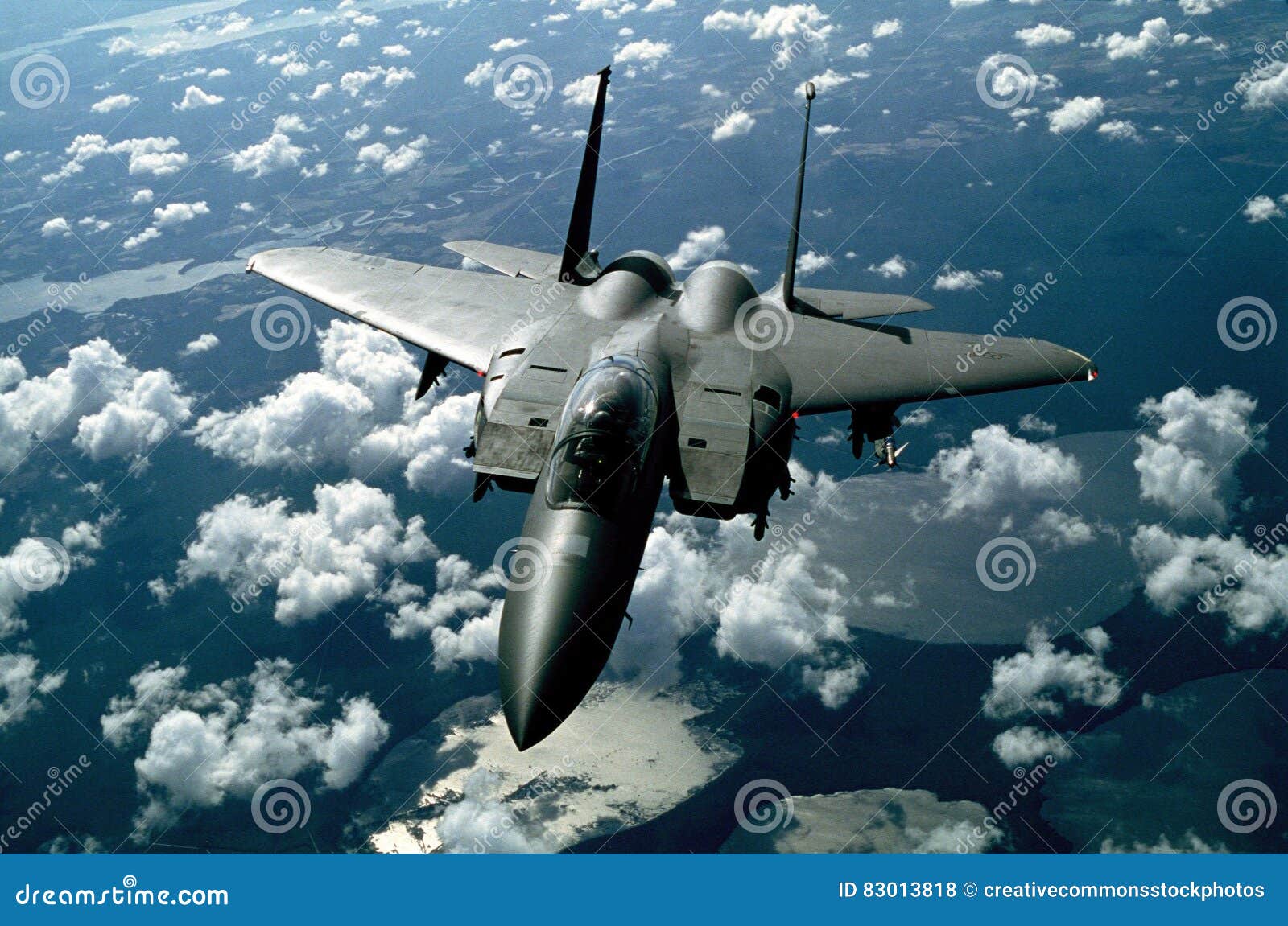 Gray Fighter Jet In White Clouds Picture. Image: 83013818