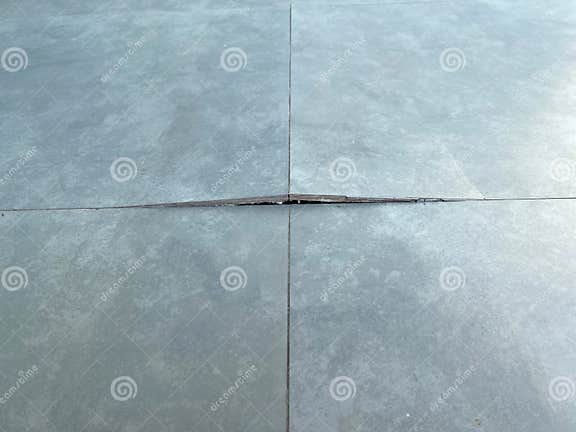 Gray Floor Tile of the House Explode and Crack from Shrinkage of the ...
