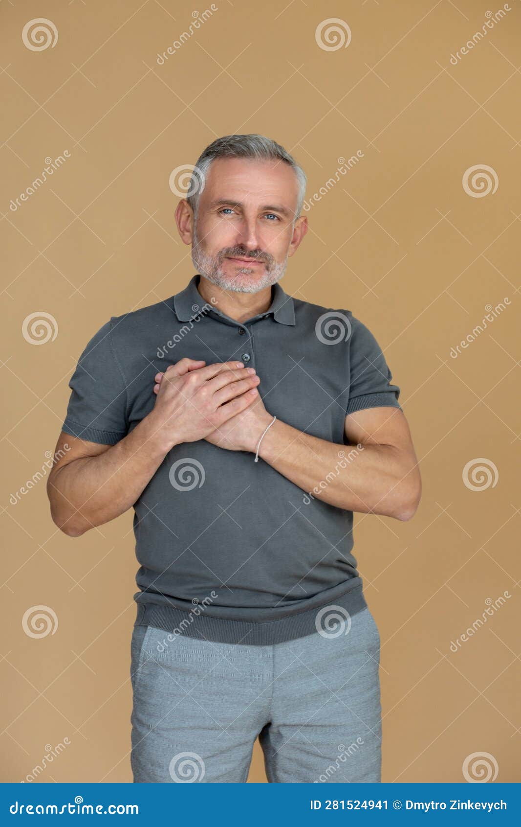 Gray-haired Bearded Man Touching Heart in Loving Gesture Stock Image ...