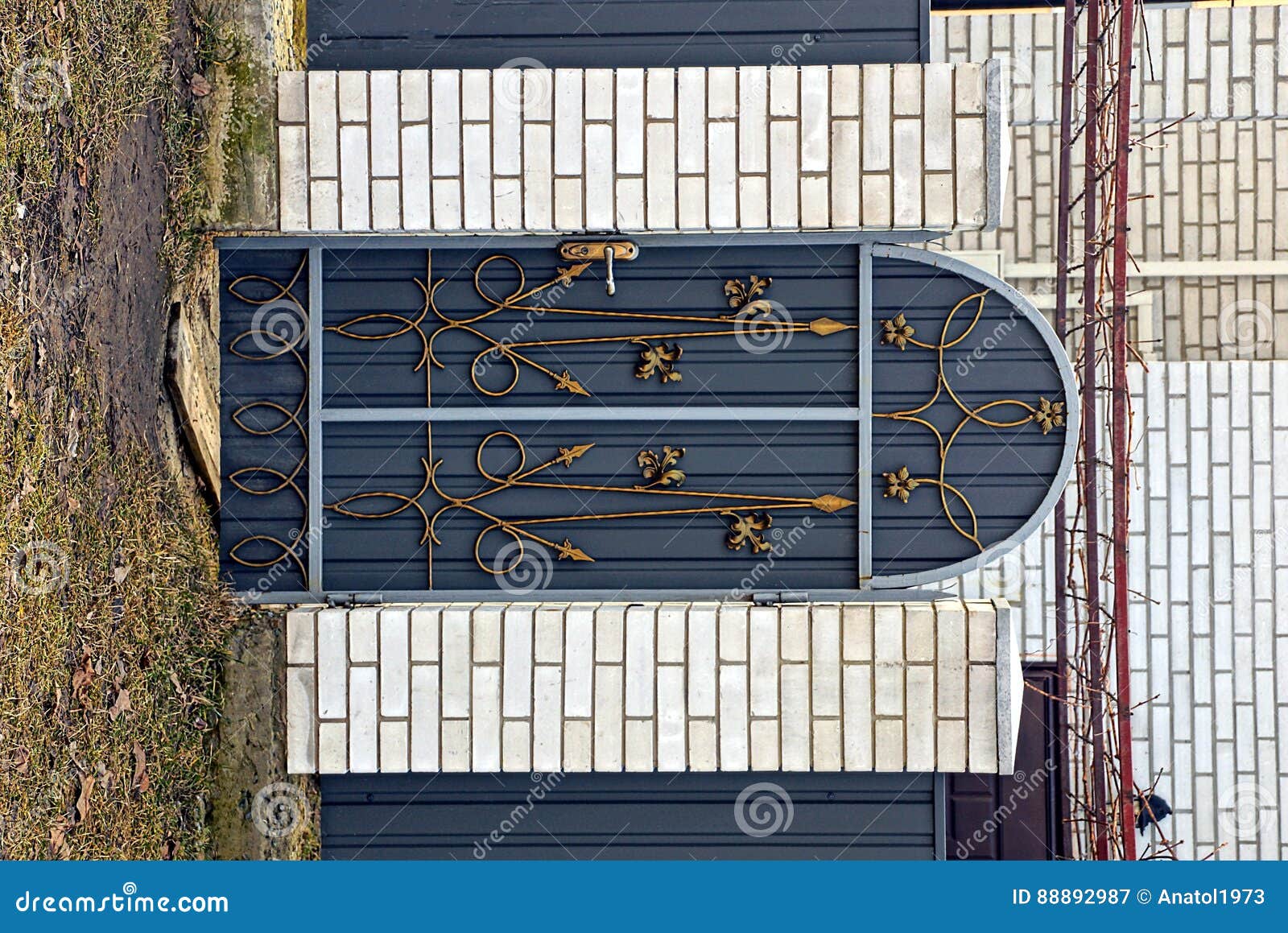 Gray Iron Gate with Brick Fence Stock Image - Image of metal, wooden ...