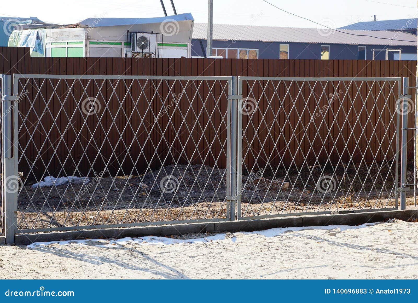 Gray Iron Metal Mesh Gate Outside in the Snow Stock Image - Image of ...