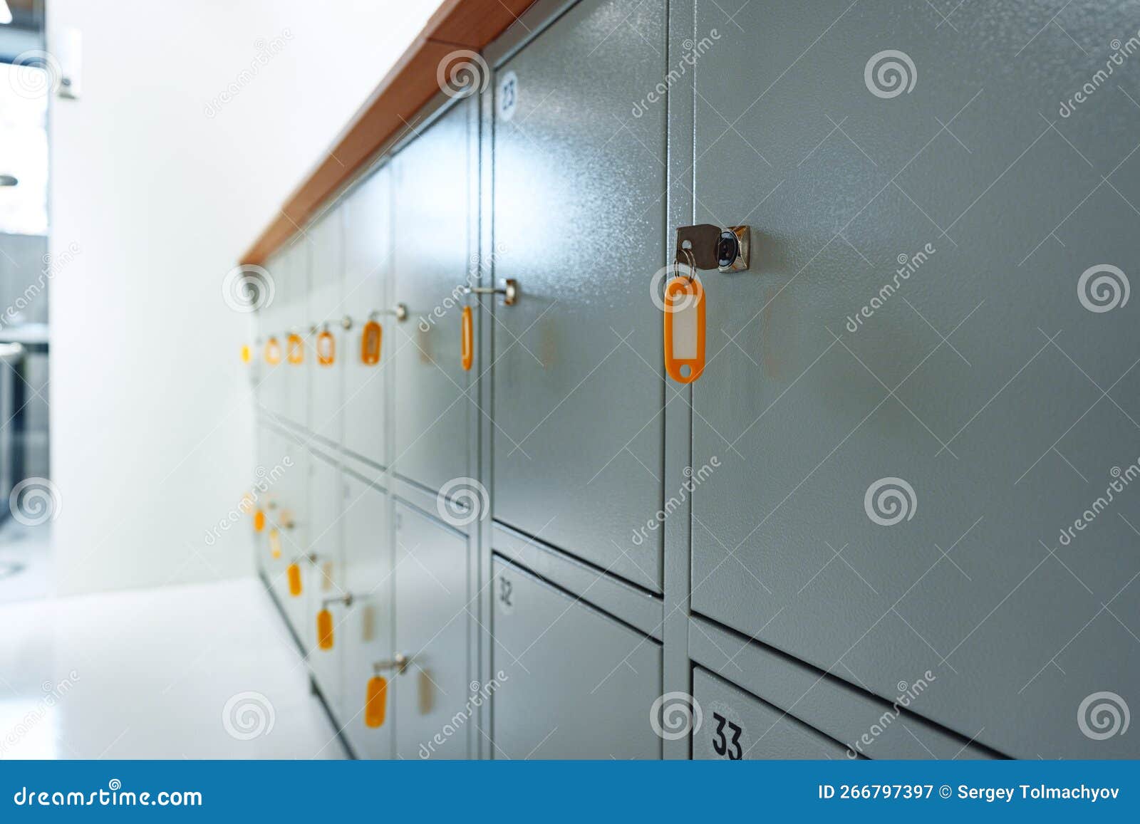 Gray Locker with Key for Safety in Public Facility Close Up Stock Image ...